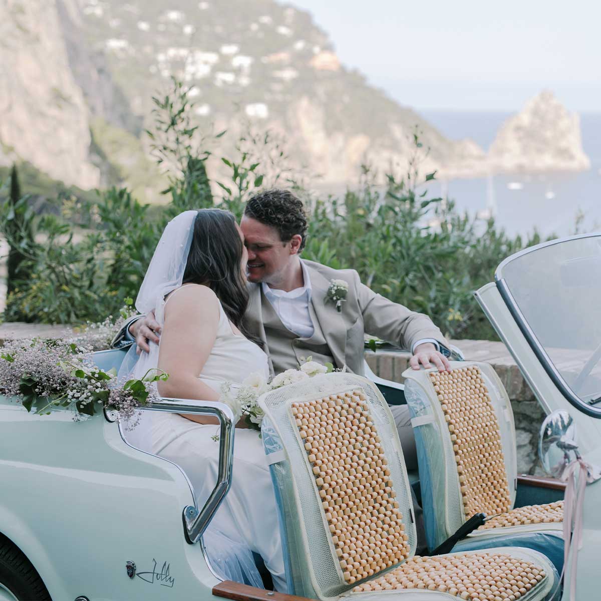 Callie & Daniel next to the Faraglioni - Capri My Day